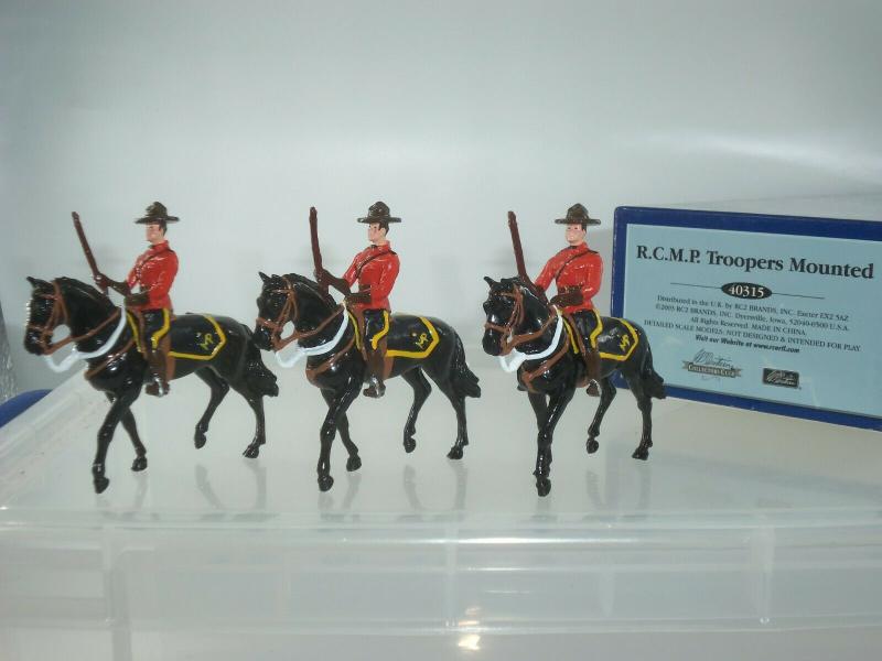 R.C.M.P. Troopers Mounted--three mounted figures--RETIRED--LAST ONE ...